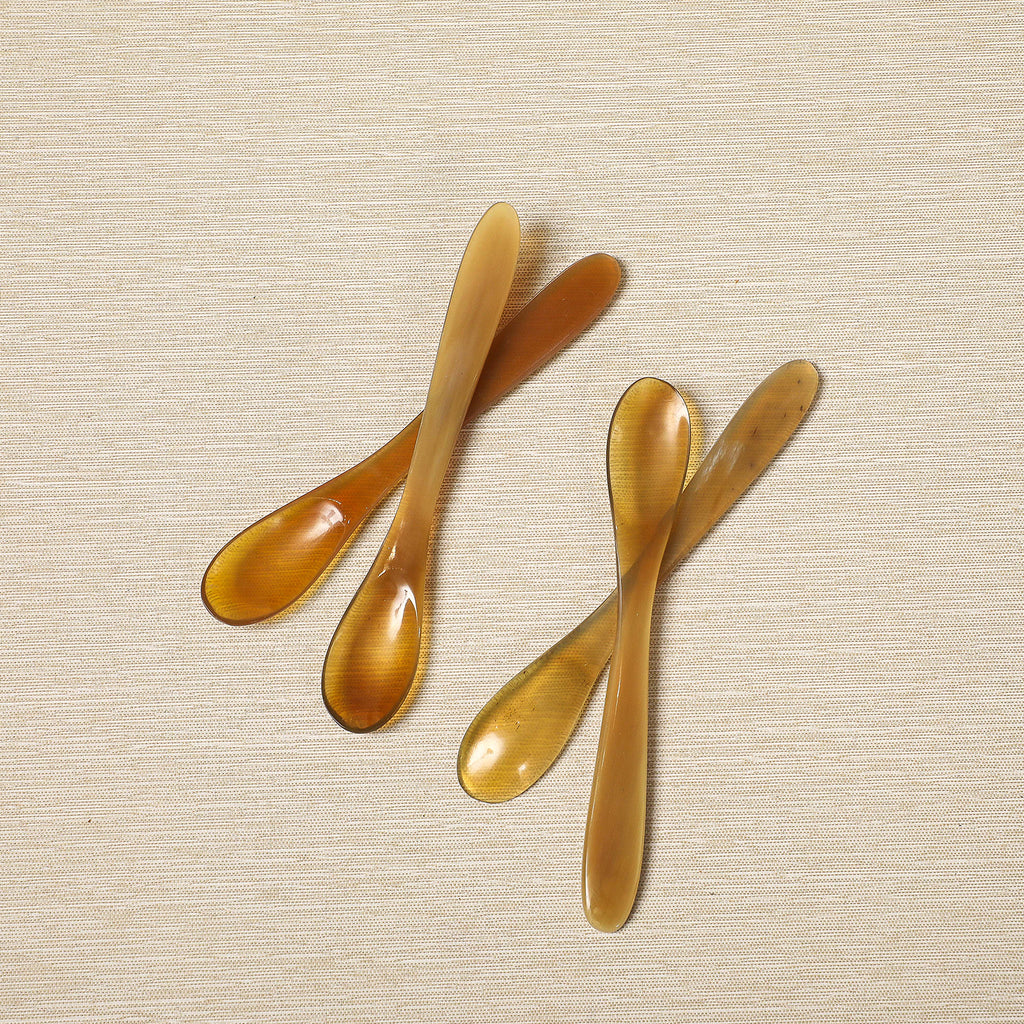 Set of four polished horn spice spoons | Copper Beech